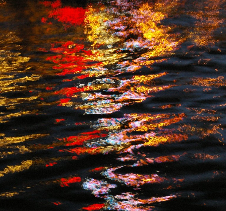 Fire reflections on water | John Jackson